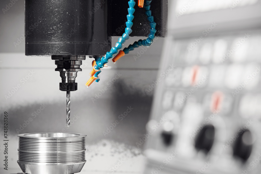 Metalworking, a numerically controlled milling machine cuts complex ...