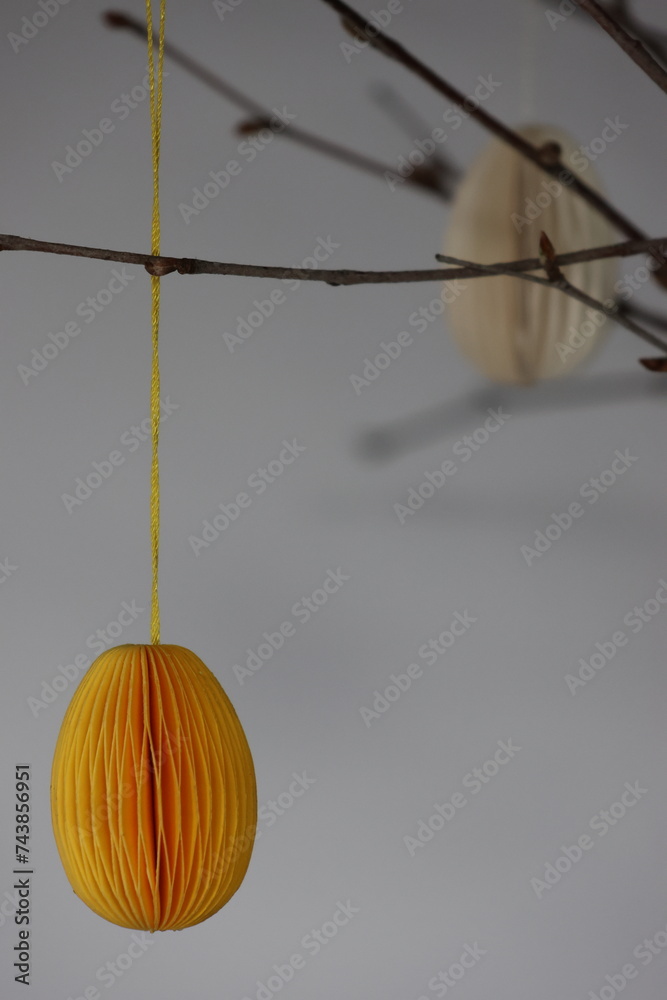 Easter Decoration. Green, yellow and white paper eggs hanging from ...