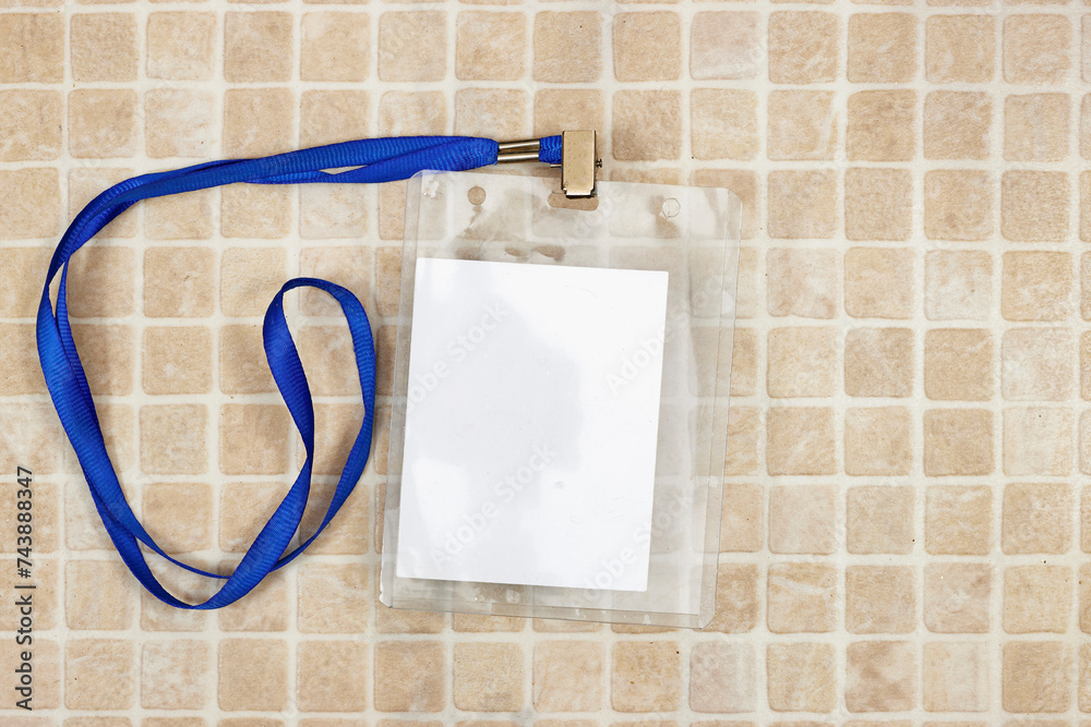 Blank badge mockup. Plain empty name tag mock up on mosaic tiles. Name ...