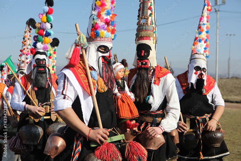 People called Kukeri parade in masks and ritual costumes, perform ...