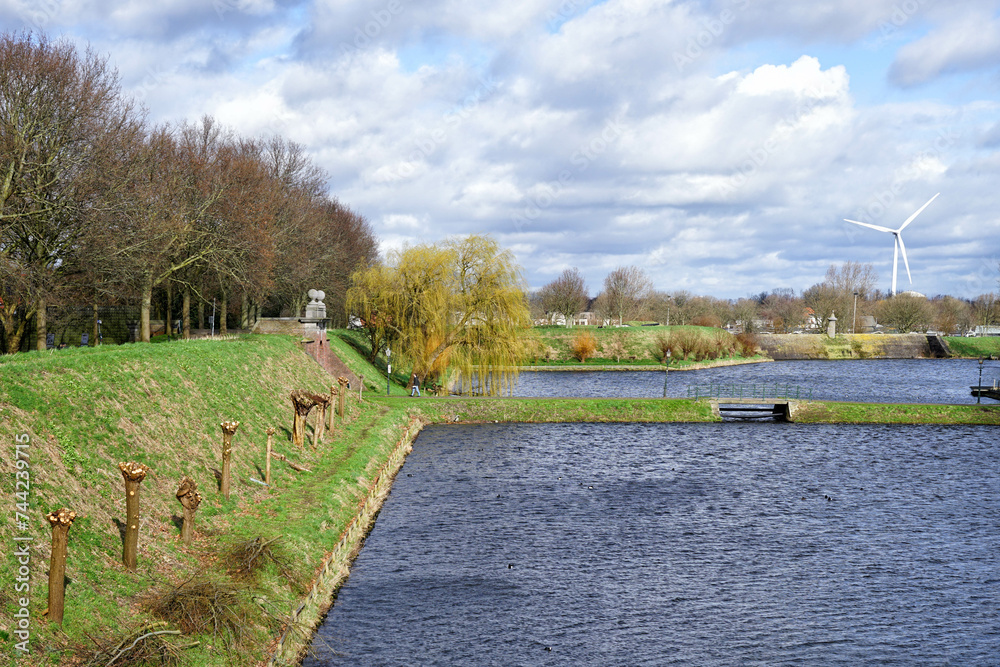 Walk along the star-shaped city walls with gates and bastions. Brielle ...
