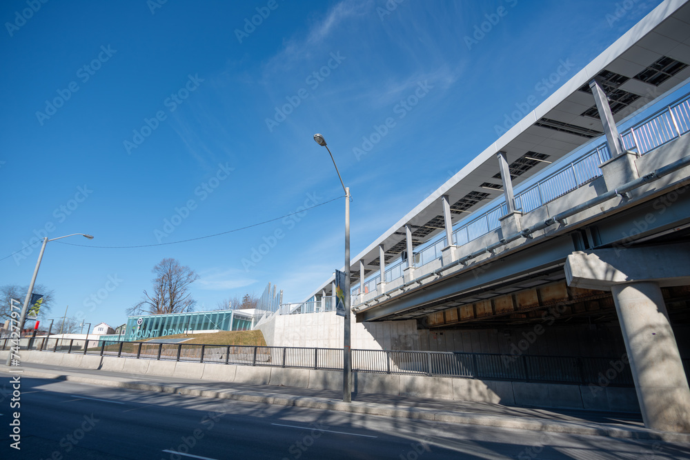wide angle view of Mount Dennis LRT Station and railway overpass ...