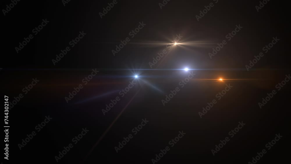 Abstract blue gold orange optical shine light lens flares moving from ...