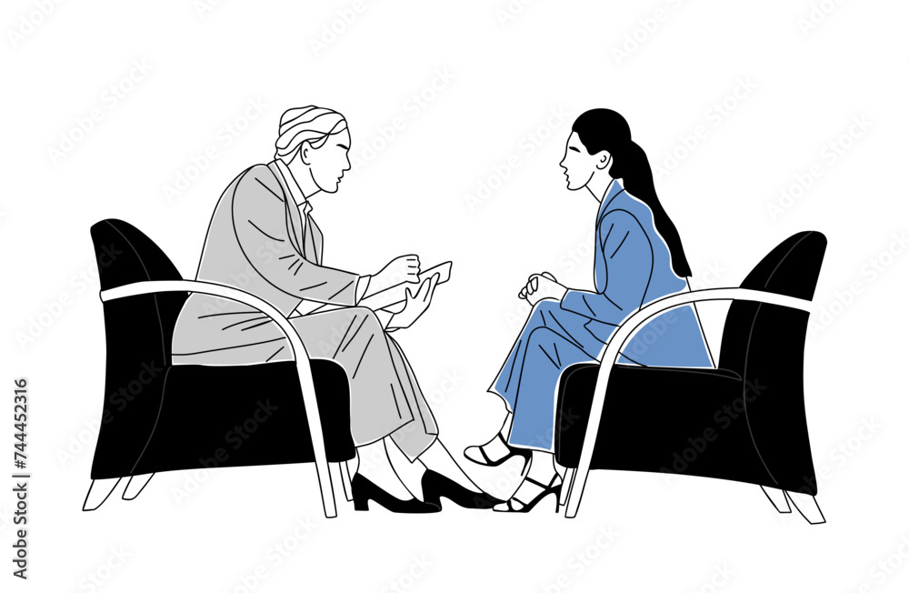 Two business women sitting in armchairs against each other. Business ...