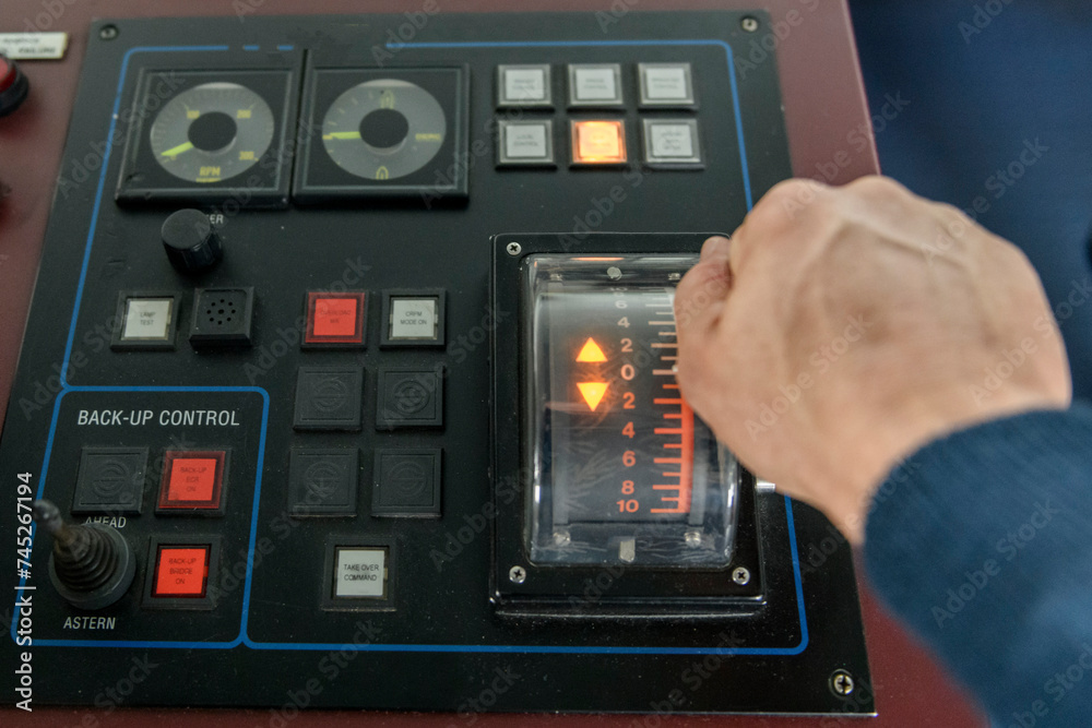 Navigational control panel with hand. Ship engine control. Navigational ...