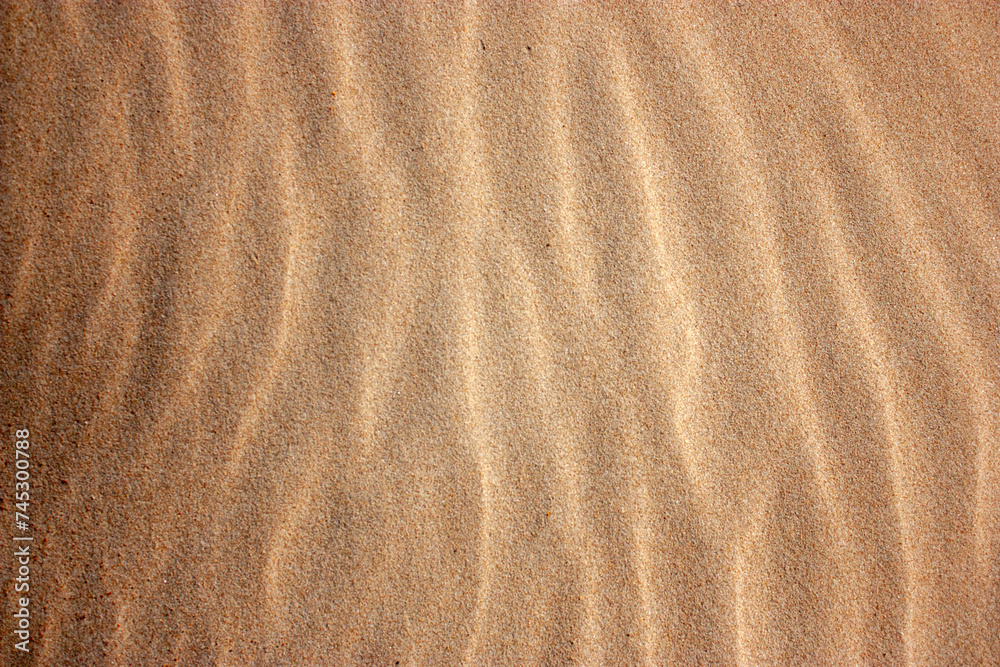 Waves on the surface of the sand, top view. The wavy surface of coastal ...