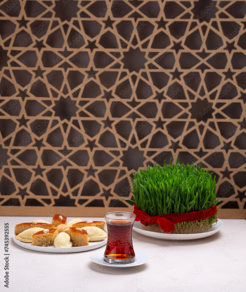 Beautiful Novruz setting with fresh wheat grass Semeni and traditional ...