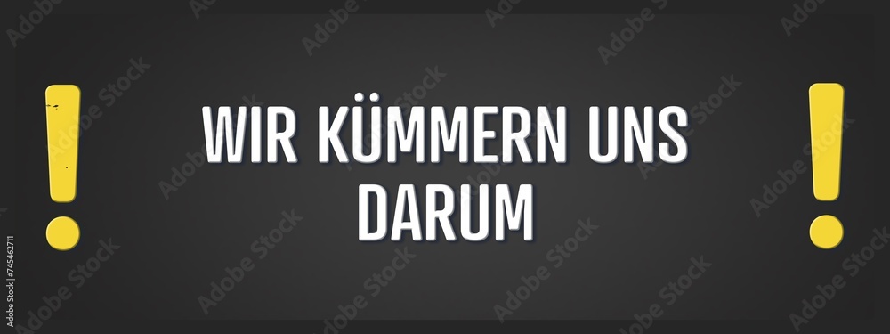 Wir kuemmern uns darum. Eine schwarze Tafel mit weissem Text ...