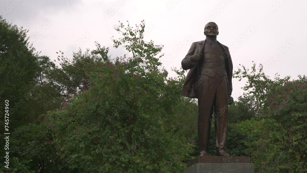 Tilting down from the left then lowering the camera to tilt up at the ...