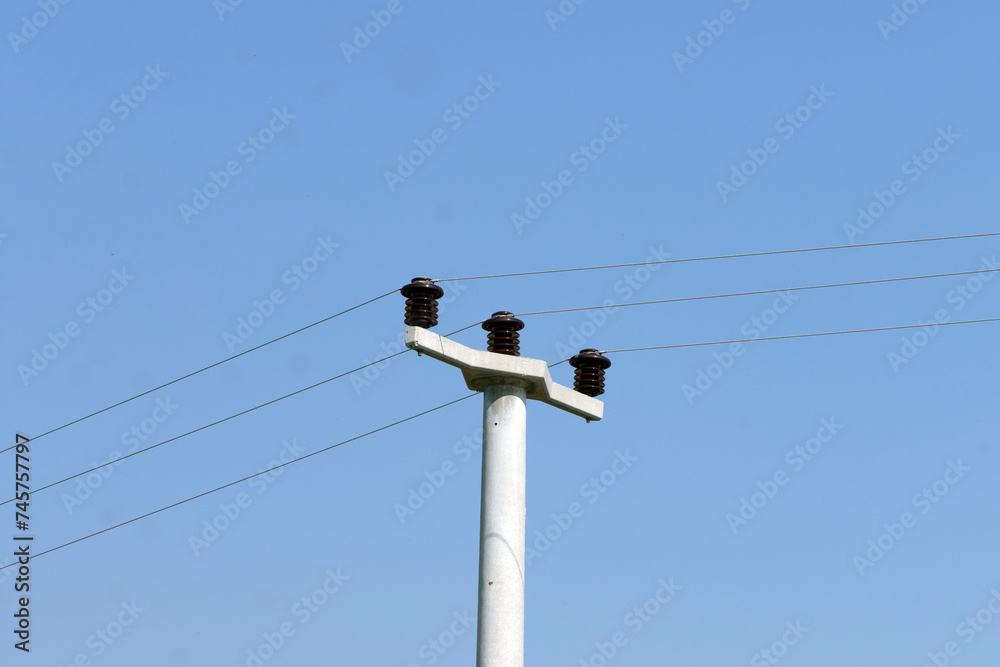 A reinforced concrete pole high energy transmission line in a rural ...
