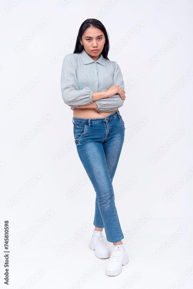 Full body portrait of a serious and introspective young Filipino woman ...