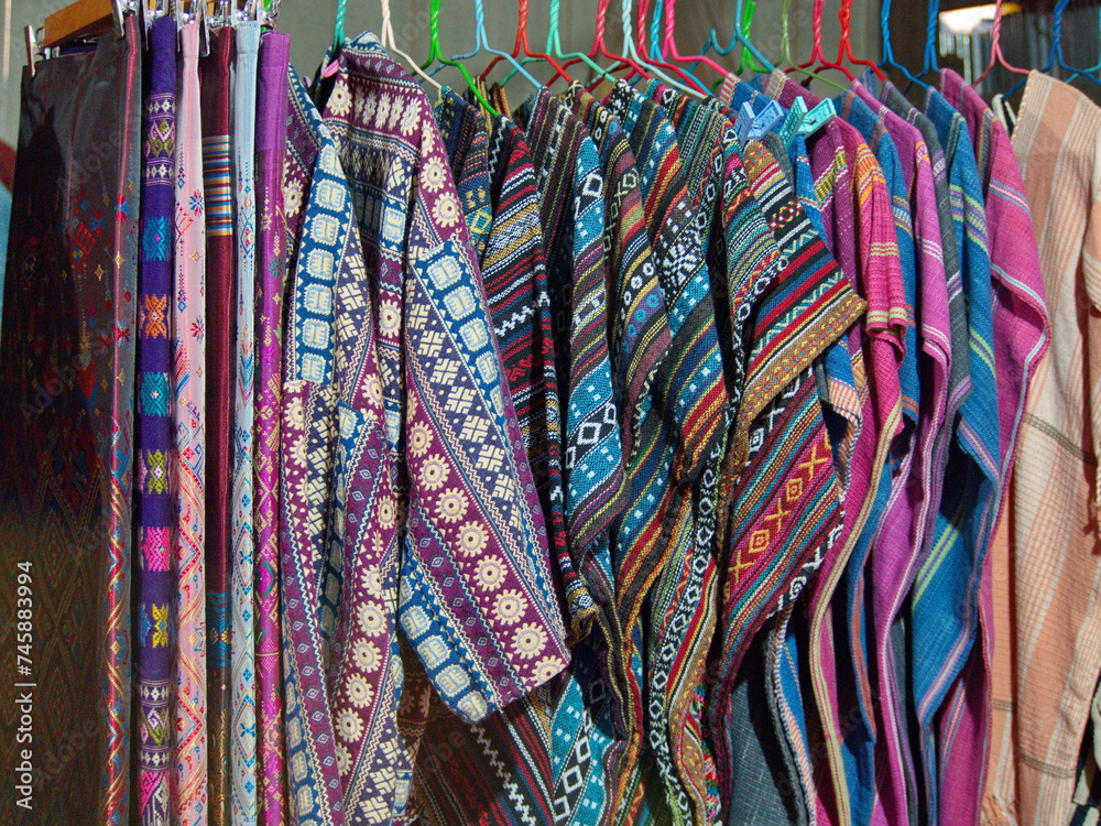 Brightly colored hand-woven skirts and beautifully patterned sarongs ...