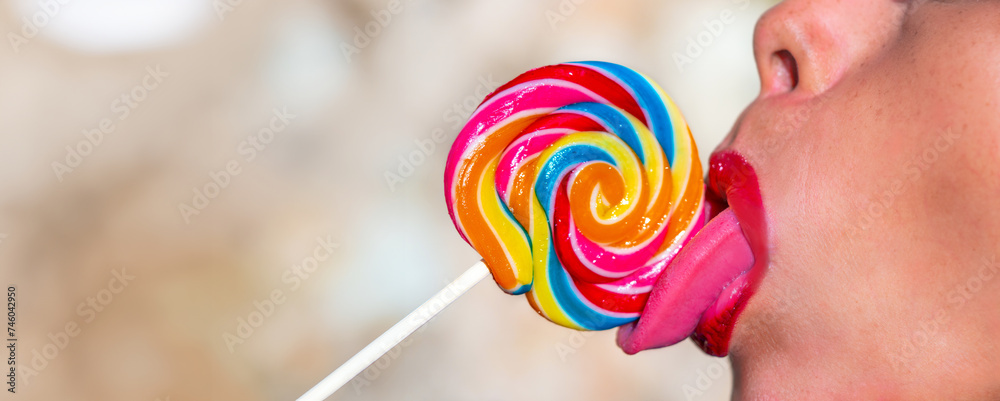 Lollipop with the colors of the rainbow in a spiral, touching inside a ...