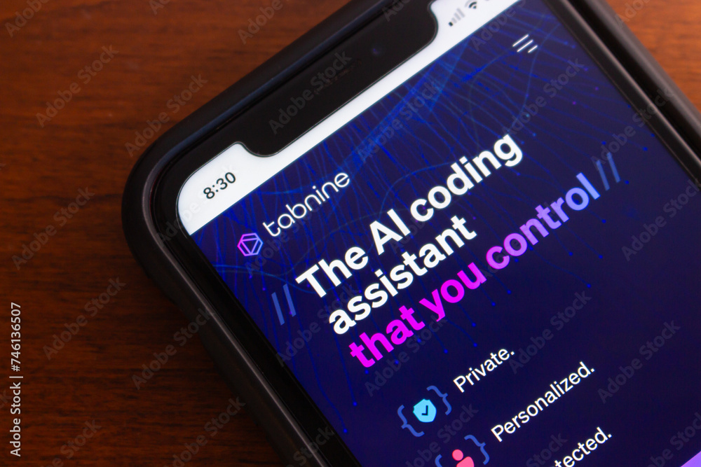 Vancouver, CANADA - Feb 14 2024 : Website of Tabnine AI seen in iPhone ... Vancouver, CANADA - Feb 14 2024 : Website of Tabnine AI seen in iPhone ...