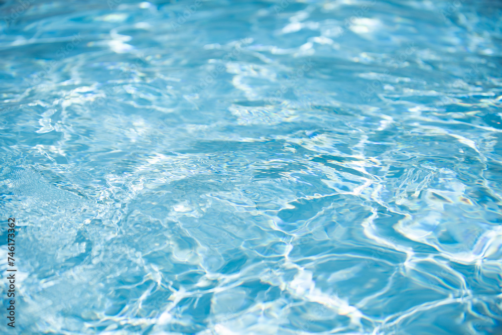 Ripped water in swimming pool. Surface of blue swimming pool ...