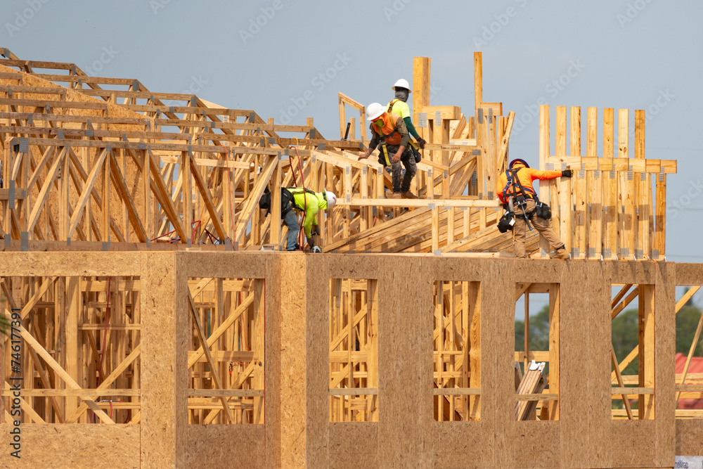 Roof repair on rooftop. Construction worker install new roof ...