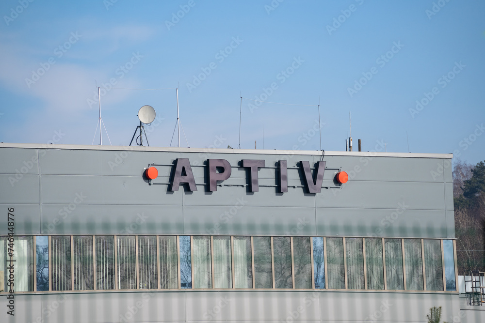 Aptiv building with logo sign. Automotive technology company, technical ...