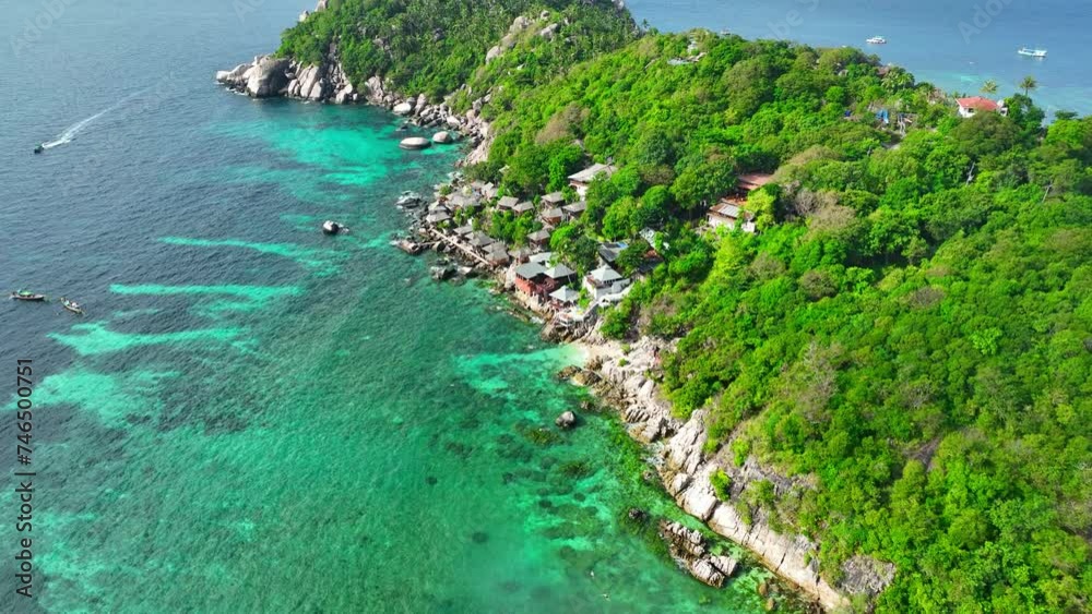 An idyllic tropical island, adorned with pristine beaches, luxurious ...