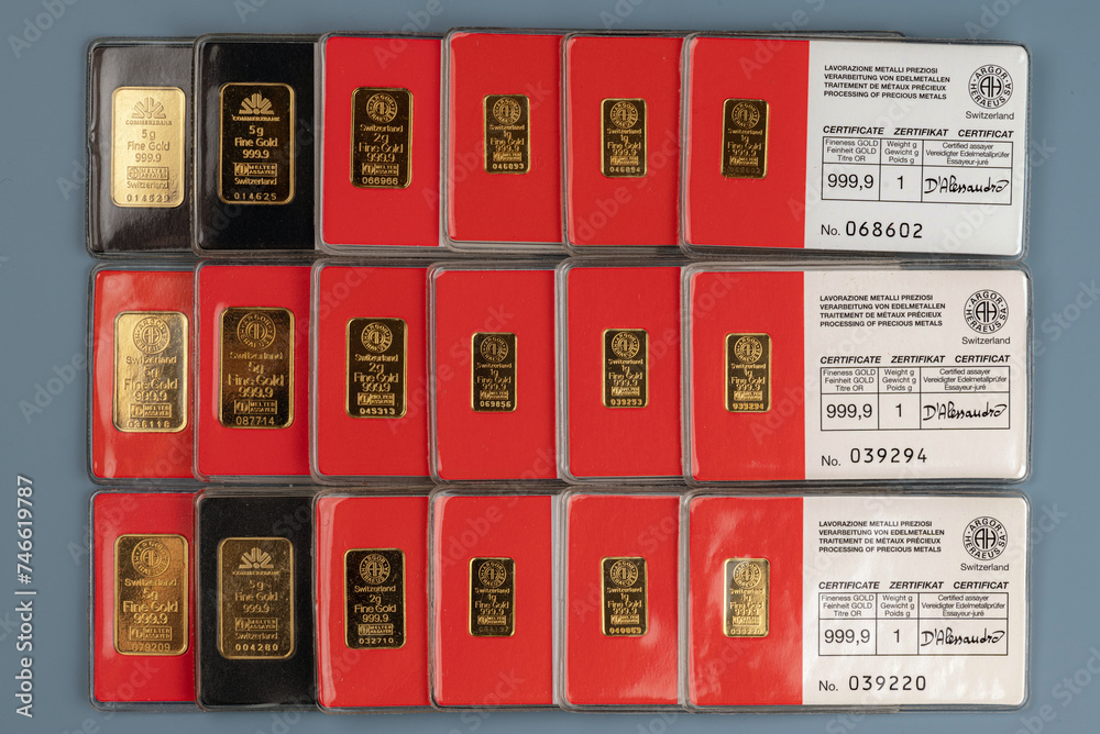 Kyiv, Ukraine - February 24, 2024: minted bars of gold various weight ...