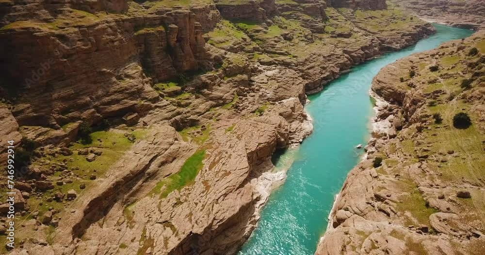 fly over turquoise color river flow in nature the canyon adventure rock ...