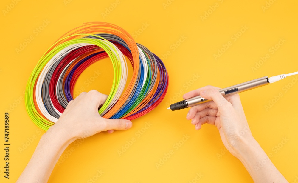 3d pen for creating volume plastic figures isolated on white background ...