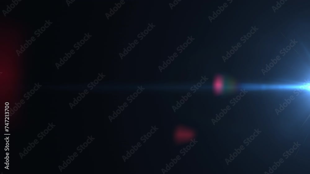 Abstract center blue optical lens flares light shine ray moving from ...