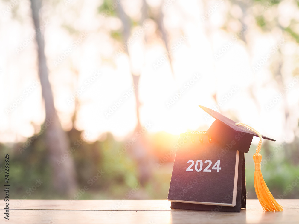 Study goals, 2024 Desk calendar with graduation hat. The concept for ...