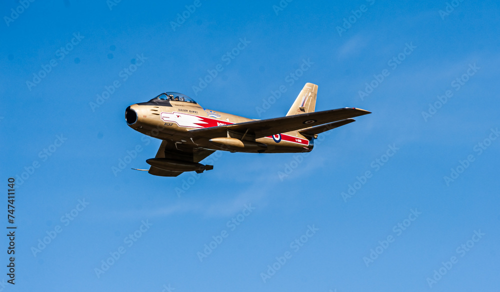 An F86 Sabre jet from the Golden Hawks, an RCAF aerobatic flying team ...