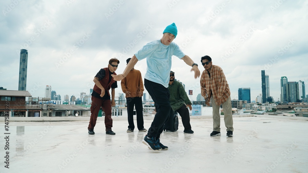 Professional break dance team practice B-boy dance while multicultural ...