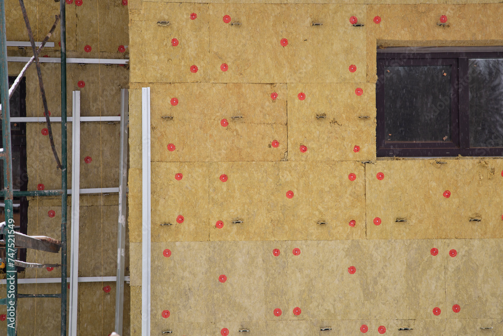 Thermal insulation of the house.Installation of thermal insulation ...