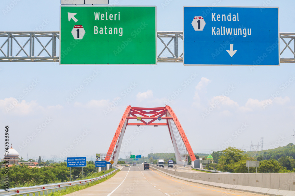 Trans Java Toll Road with signs bearing the names of destination cities ...