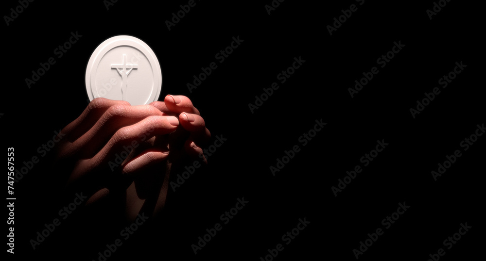 A priest who holds the consecrated host, who is Our Lord Jesus Christ ...