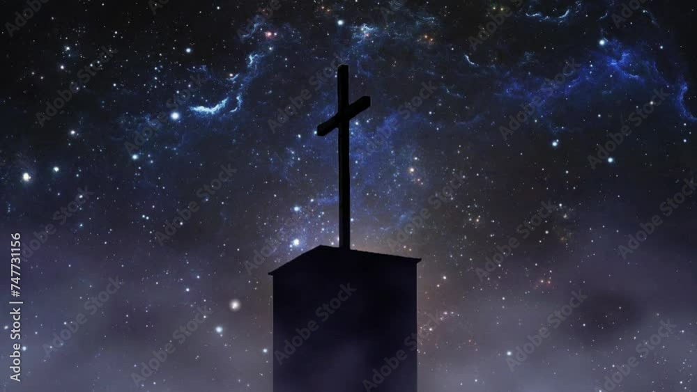cross pillar silhouetted above the tower with a starry sky background ...