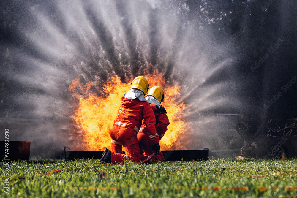 Firefighter Concept. Several firefighters go offensive for a fire ...