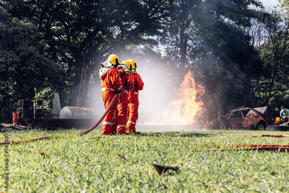 Firefighter Concept. Several firefighters go offensive for a fire ...