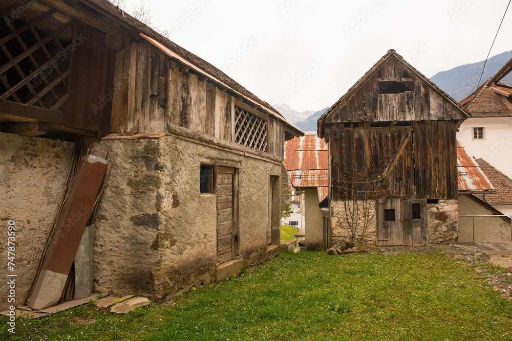 Historic stone buildings in the mountain village of Magnanins near ...