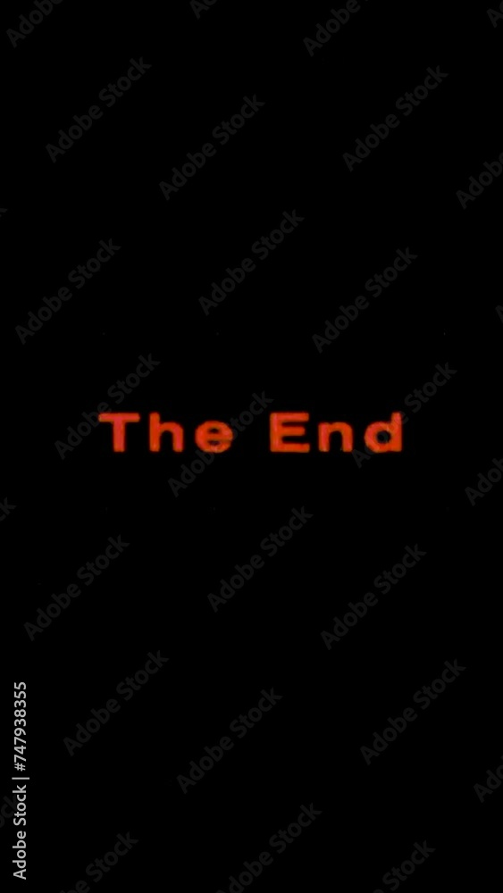 The End, vertical black background for stories and reels, vintage video ...
