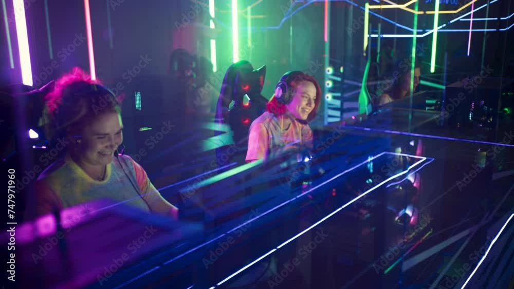 Team Of Teenage Girls Having Fun Gaming On Modern Powerful Computers ...