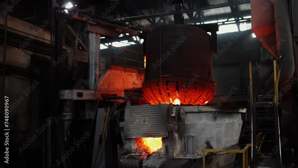 Vidéo Stock Industrial Crane Dumps Metal Scrap Parts In A Red-hot ...