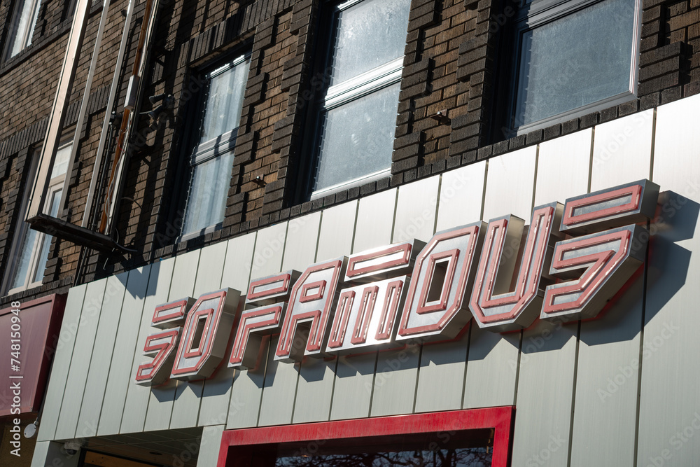 exterior building facade and sign of So Famous 真有名, a chinese takeaway ...