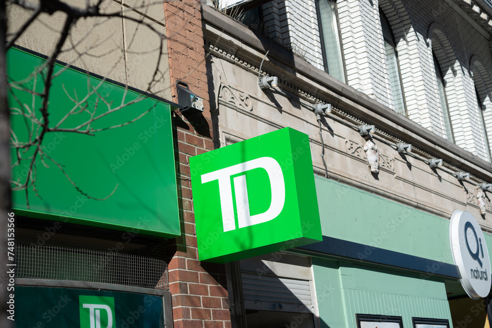 exterior building facade and sign of TD Canada Trust Branch and ATM ...