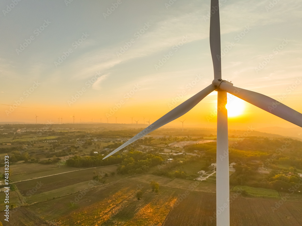 Wind farm field and sunset sky. Wind power. Sustainable, renewable ...