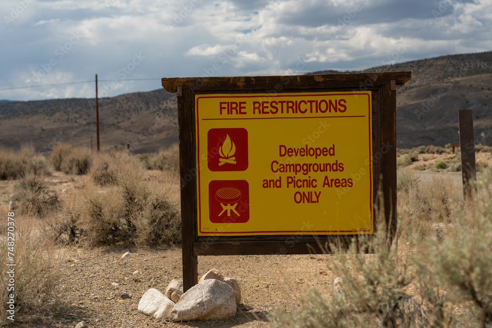 FIRE RESTRICTIONS Sign in Nevada Desert. Open flame (cooking and camp ...