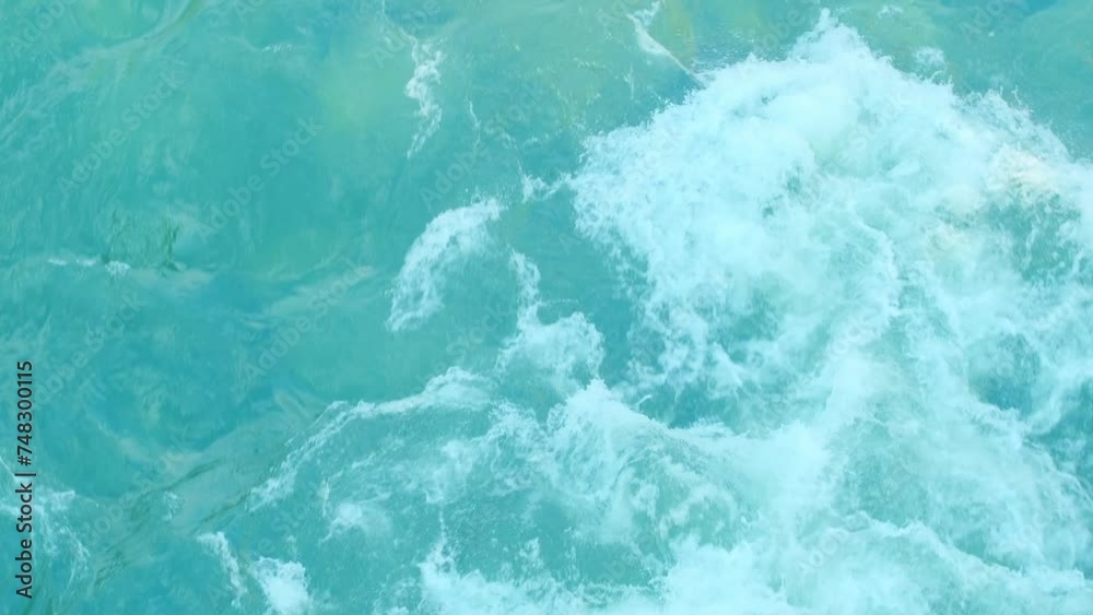 Top view of a rapidly seething stream of water. Big powerful ocean ...