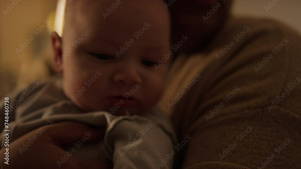Vidéo Stock Close-up shot of face of restless young baby boy or girl ...