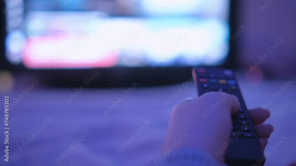 4K men hand holding the TV remote control and turn off smart tv ...