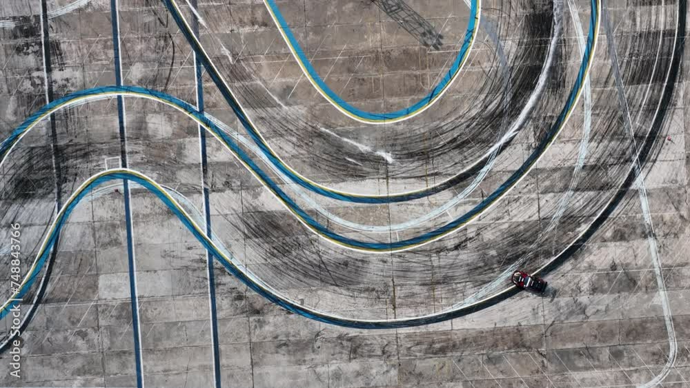 Blurred car drifting diffusion race drift car with lots of smoke from ...