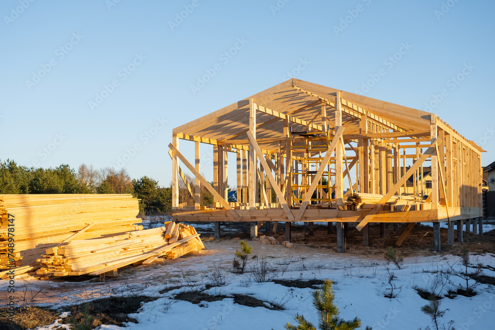 Construction of a wooden frame house - frame from the foundation, walls ...
