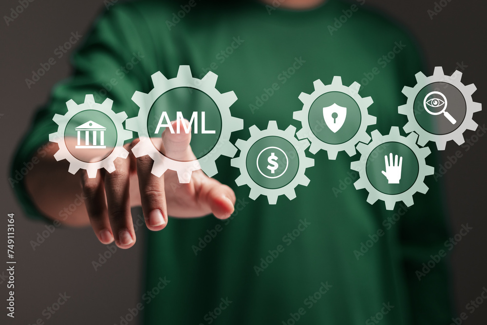 AML, Anti money laundering financial bank concept. Businessman touching ...