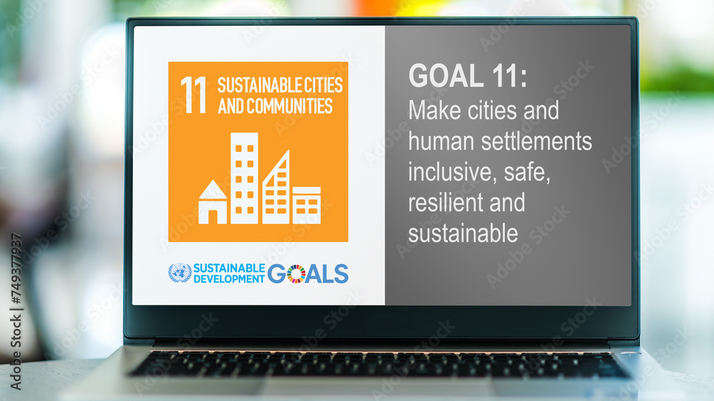 Laptop displaying logo of The Sustainable Development Goal 11 Stock ...
